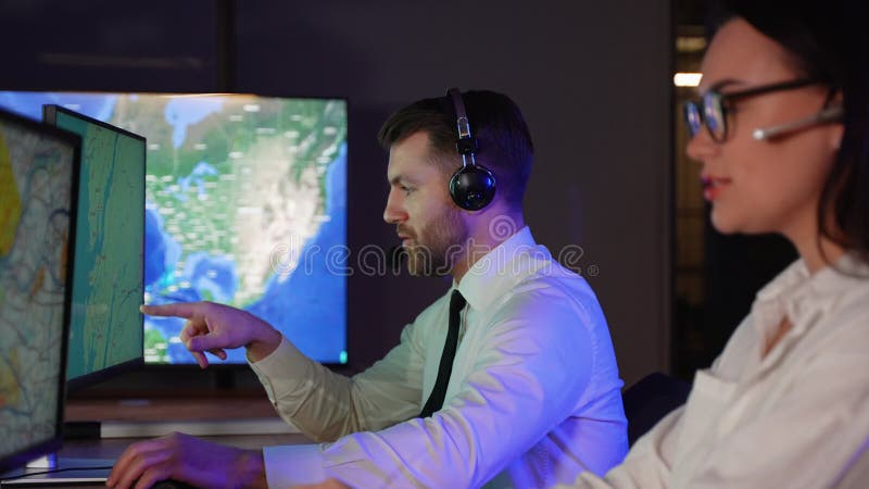 Air Traffic Controller in Headphones Talking with the Pilot of the ...