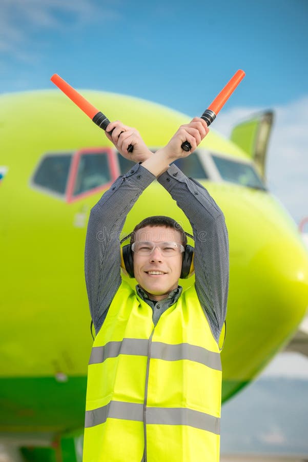 Air Traffic Controller Monitors Flight Activities during Sunset at a ...