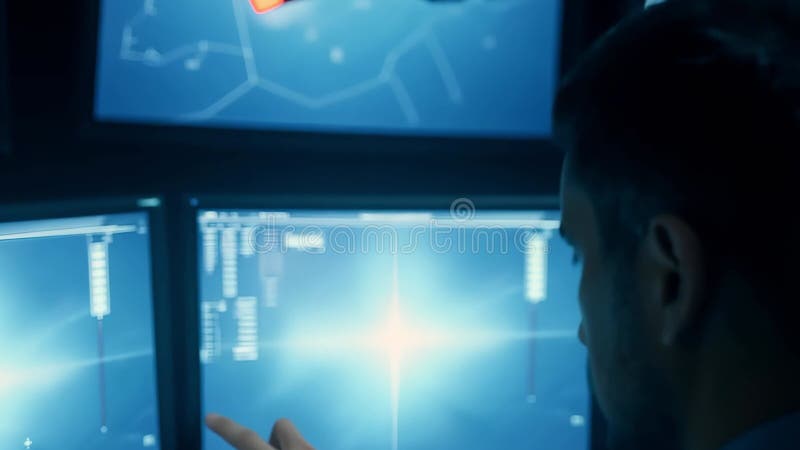 Air Traffic Controller Managing Drone Flight, Checking Data on Computer ...