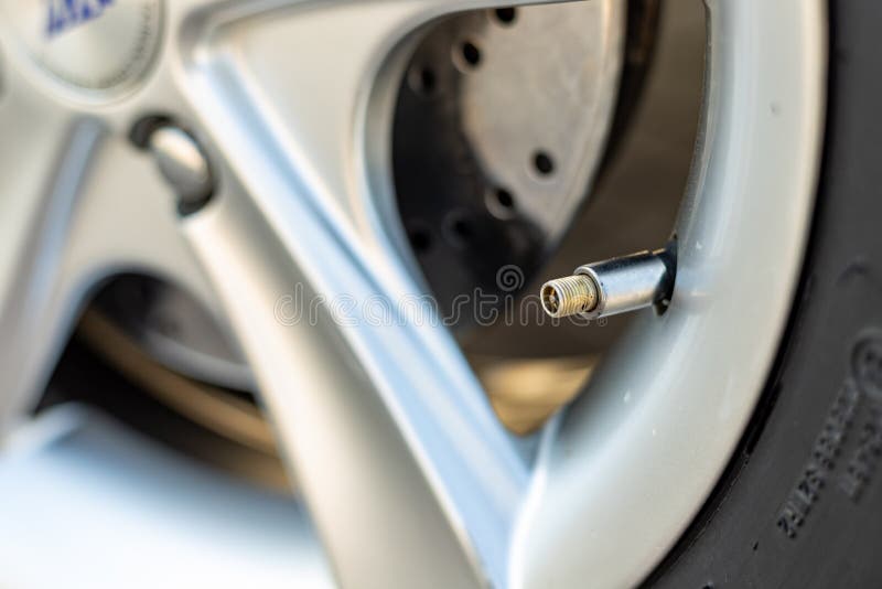 Air Valve in a Car Tyre Close-up Stock Photo - Image of aluminum, close ...