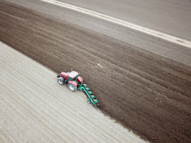 Air View of Plowing Red Tractor on the Field Stock Image - Image of ...
