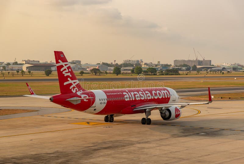 AirAsia Plane at Sunrise editorial image. Image of airport - 320546630