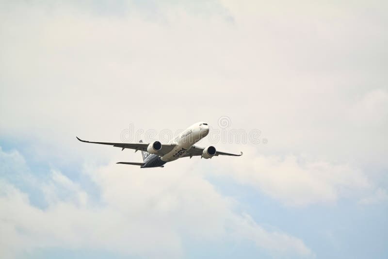 Airbus A350 in the Cloudy Sky Editorial Stock Image - Image of avia ...