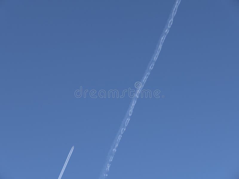 Aircraft with contrail stock image. Image of smoke, contrail - 140724407