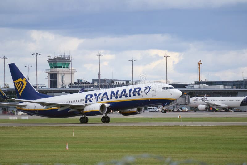 .a Aircraft Crossing an Airport Runway during Take-off Stock Photo ...