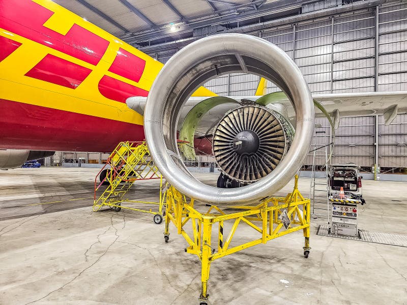 Aircraft Engine Close-up with Service Platform Inside Hangar during ...