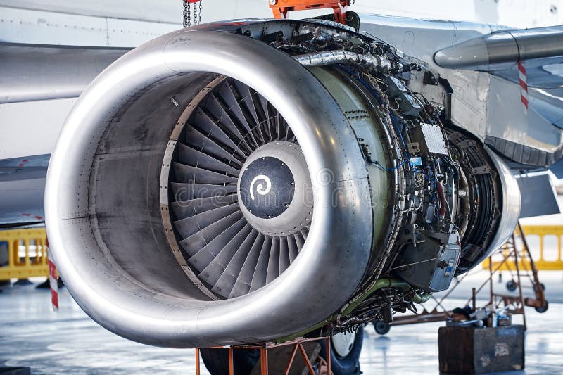 Aircraft Engine Servicing - Opened Panels of a Large Engine of Parked ...