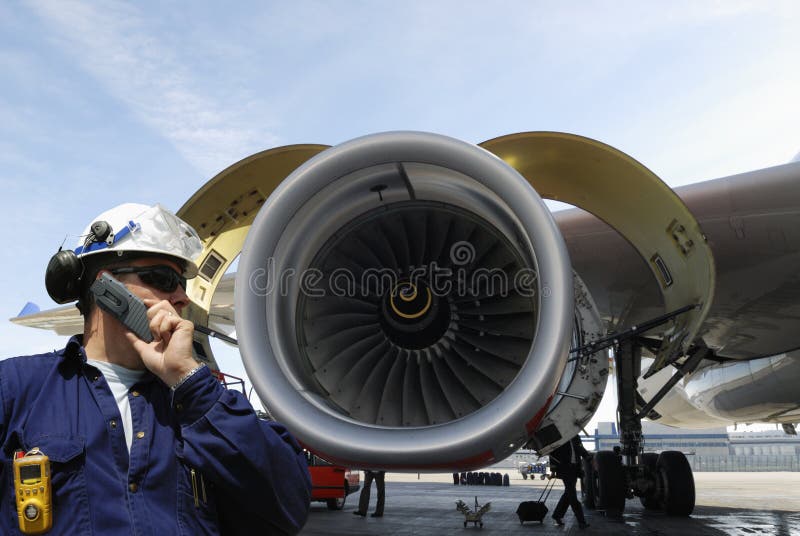 Airplane Mechanic and Jet Engine Stock Image - Image of hardhat, flying ...