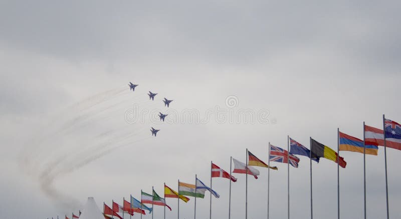 Aircraft and flags stock photo. Image of trail, horizontal - 50509772
