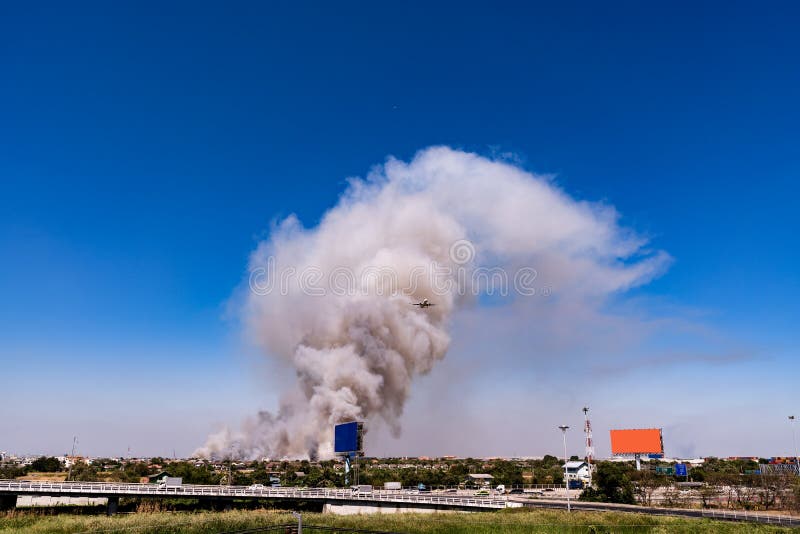 Aircraft Fly Pass through Fire and Giant Smoke Stock Image - Image of ...
