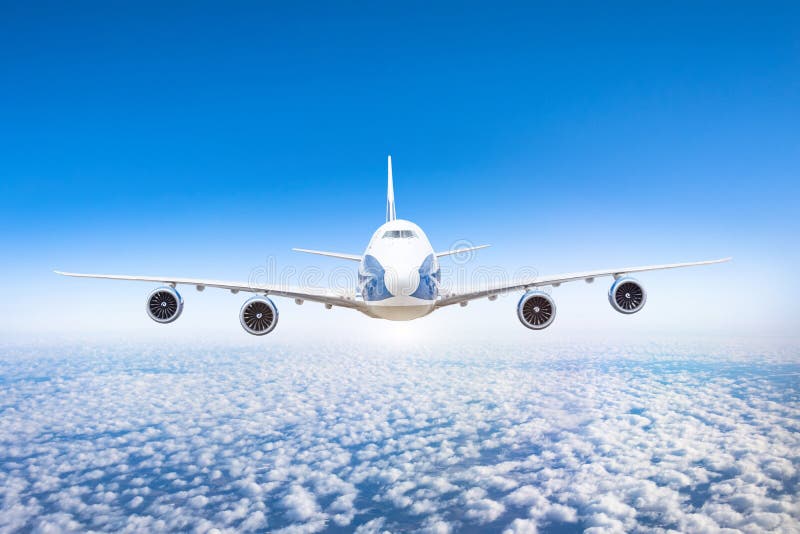 Aircraft Flying at Flight Level High in the Sky Above the Clouds and ...