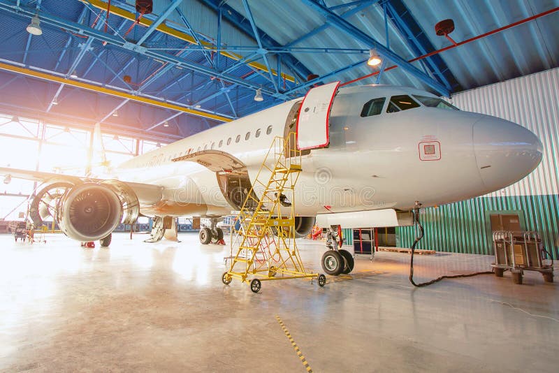 Aircraft in the Hangar for Maintenance Stock Image - Image of aviation ...
