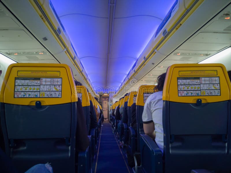 Aircraft Interiors and Cabin Full of Passengers during Flight Stock ...