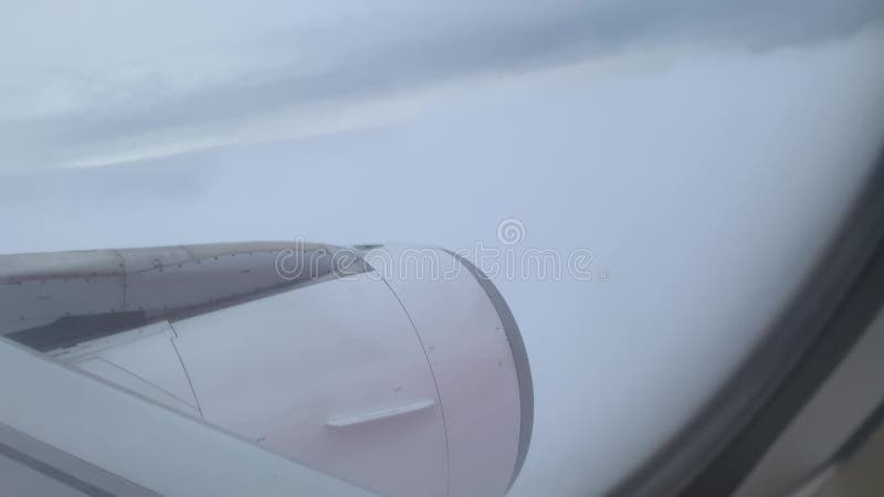 Aircraft Jet Engine Descent into Overcast Sky Cloud. View from Window ...