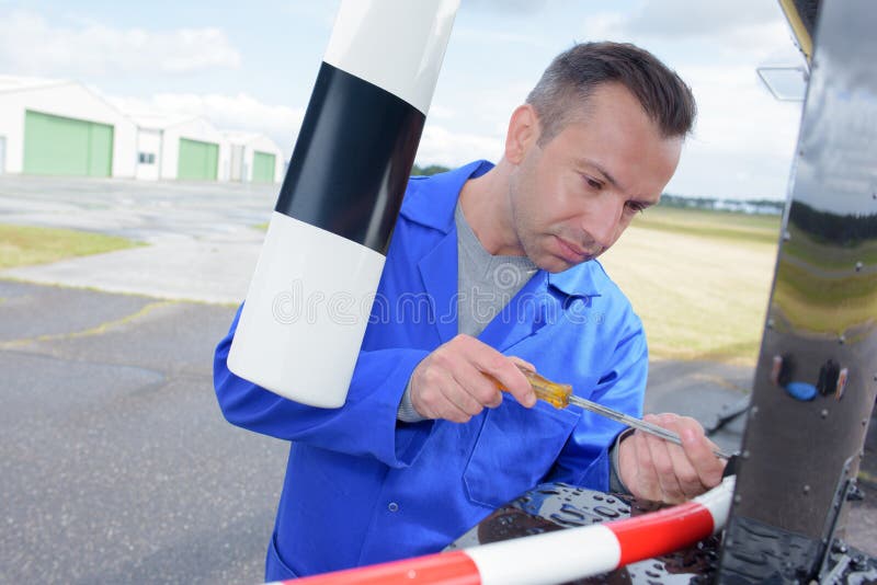 Aircraft Mechanic Fixing Problem Stock Image - Image of landing ...