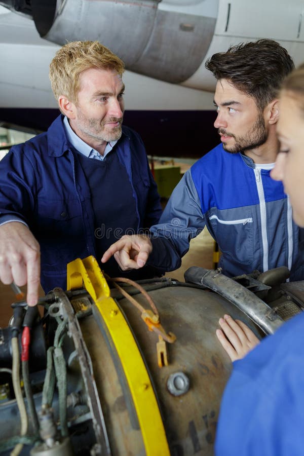 Aircraft Mechanics Repair Engine Airplane Stock Photo - Image of ...