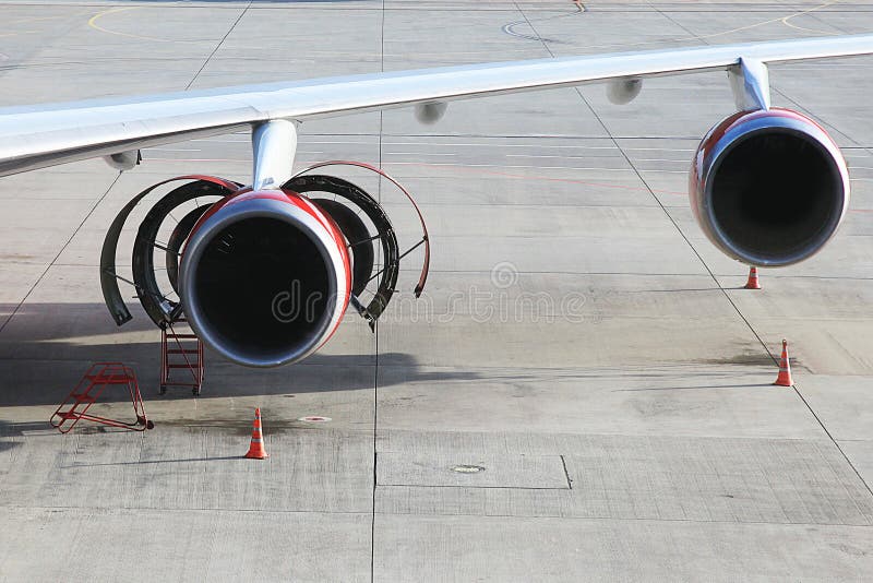 Aircraft with open engine stock photo. Image of detail - 129198874
