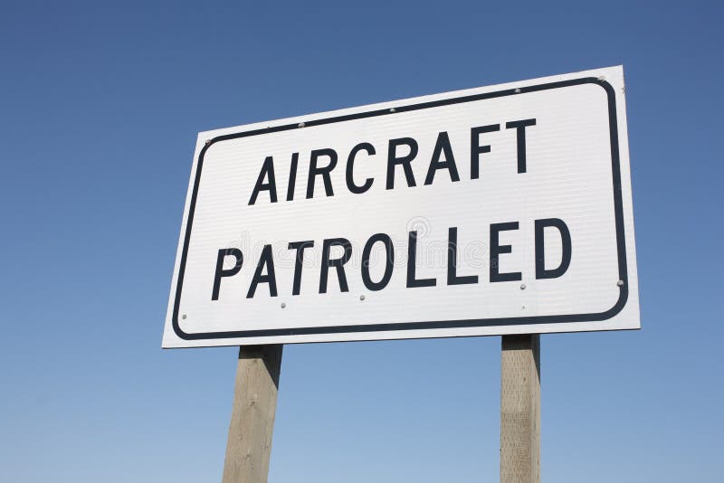 Aircraft Patrolled Sign stock photo. Image of government - 55236084