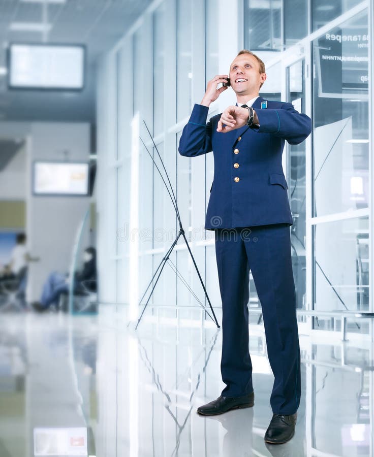 Aircraft Pilot Talking by Phone in Airport Area Stock Photo - Image of ...