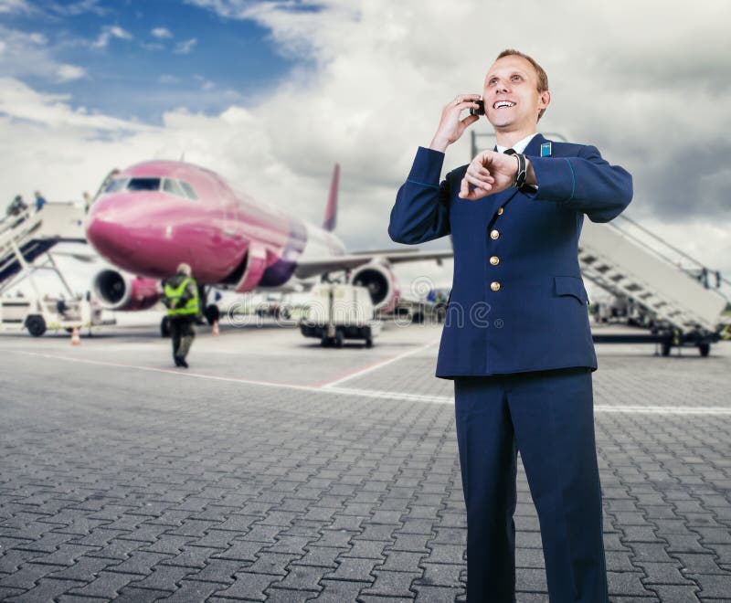 Aircraft Pilot Talking by Phone on Airport Runway before Flight Stock ...