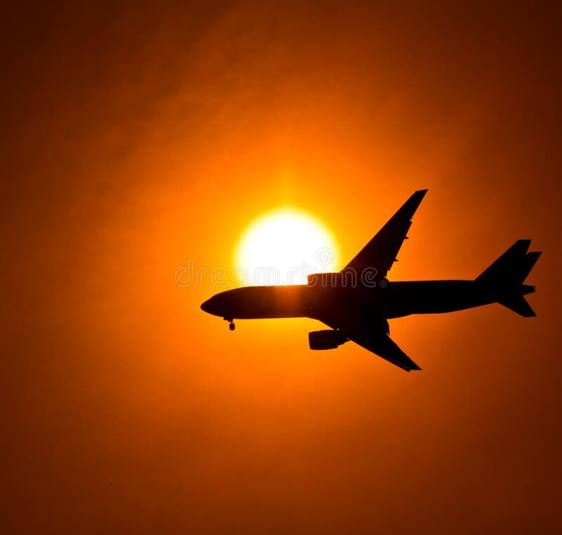 Aircraft in the sunset stock photo. Image of airport - 38277474