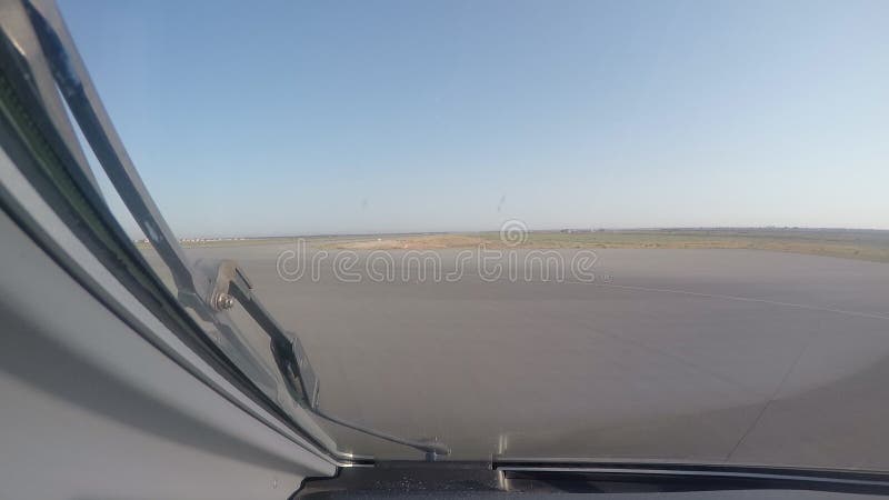 View from the Cockpit of the Plane while it is Flying High in the Sky ...