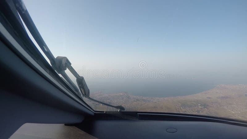View from the Cockpit of the Plane while it is Flying High in the Sky ...
