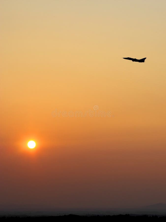 Aircraft takeoff at sunset stock photo. Image of yellow - 27329462