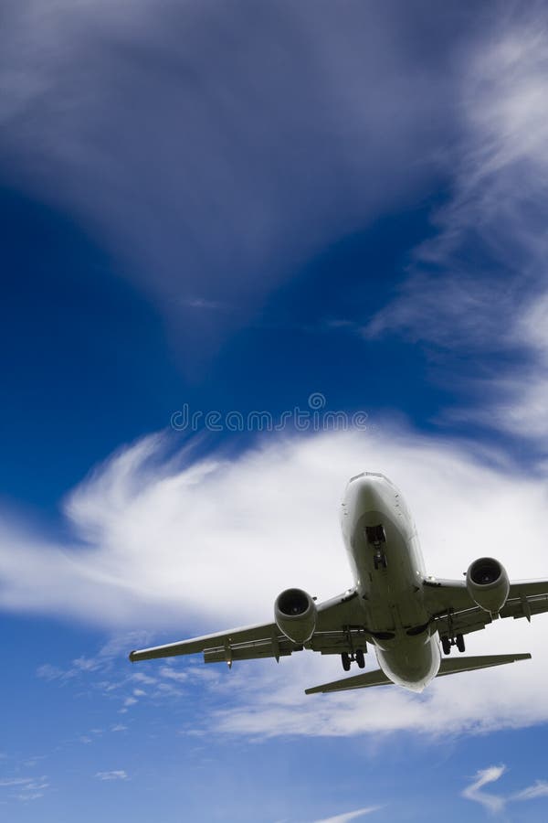 Aircraft Taking Off into Dramatic Deep Blue Summer Sky Stock Photo ...