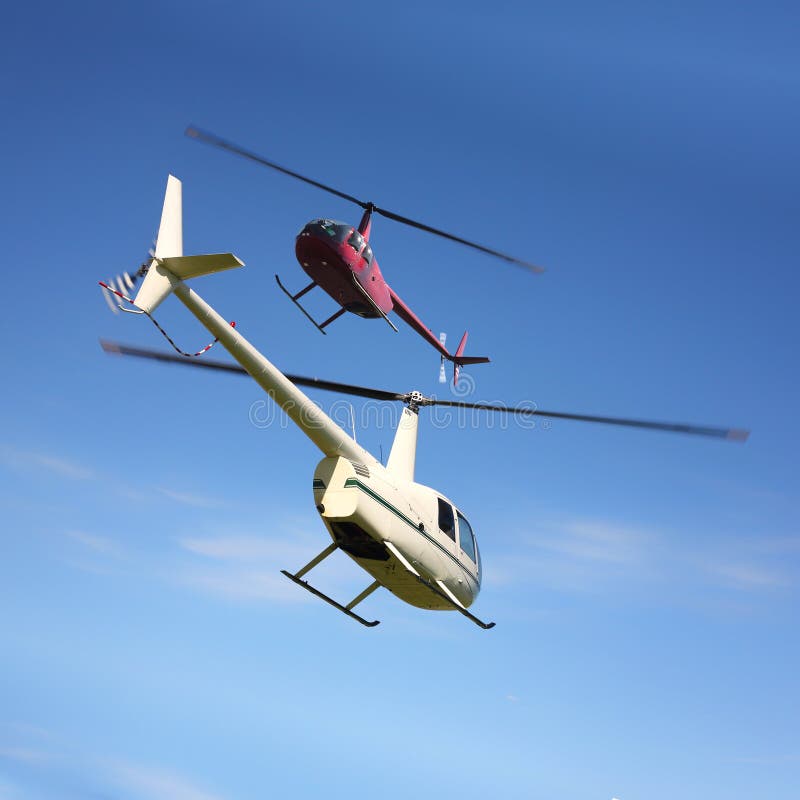 Two Small Helicopters Take Off Stock Image - Image of airship, flight ...
