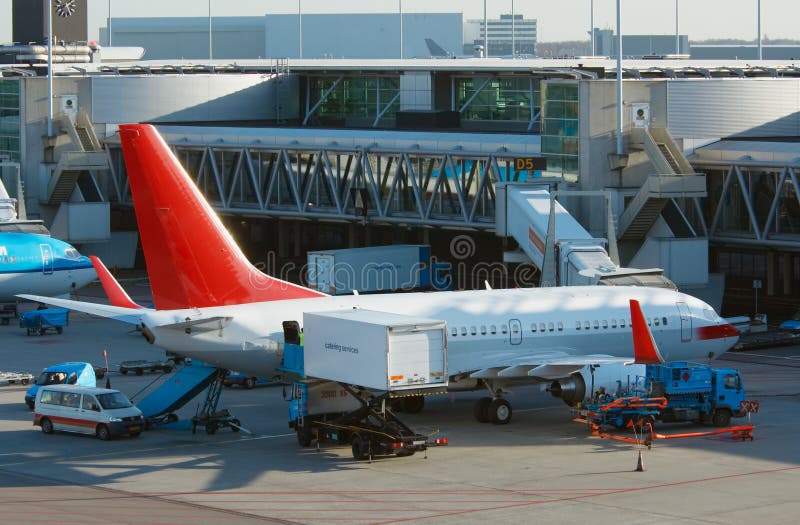 Aircraft unloading cargo stock photo. Image of carrier - 1794652