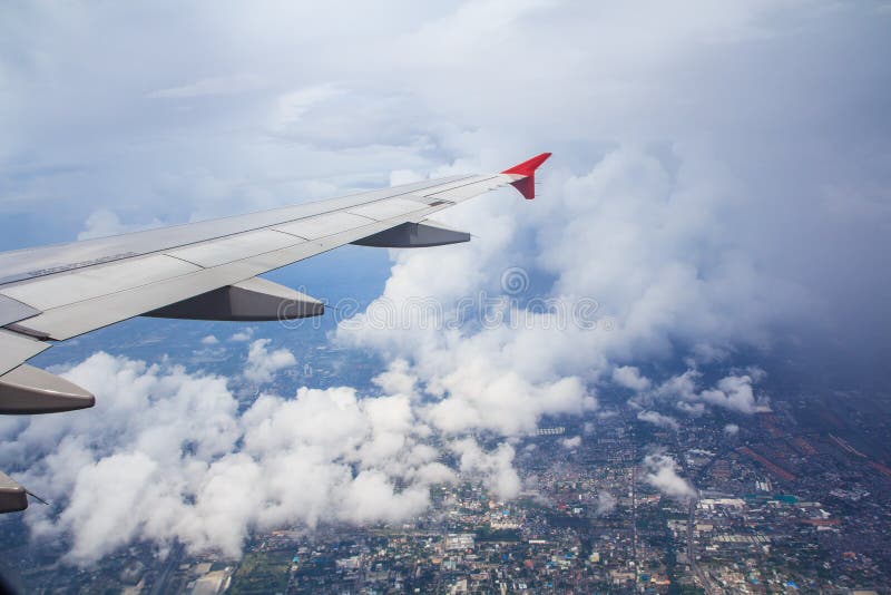 Aircraft wing in the air stock photo. Image of earth - 37637518