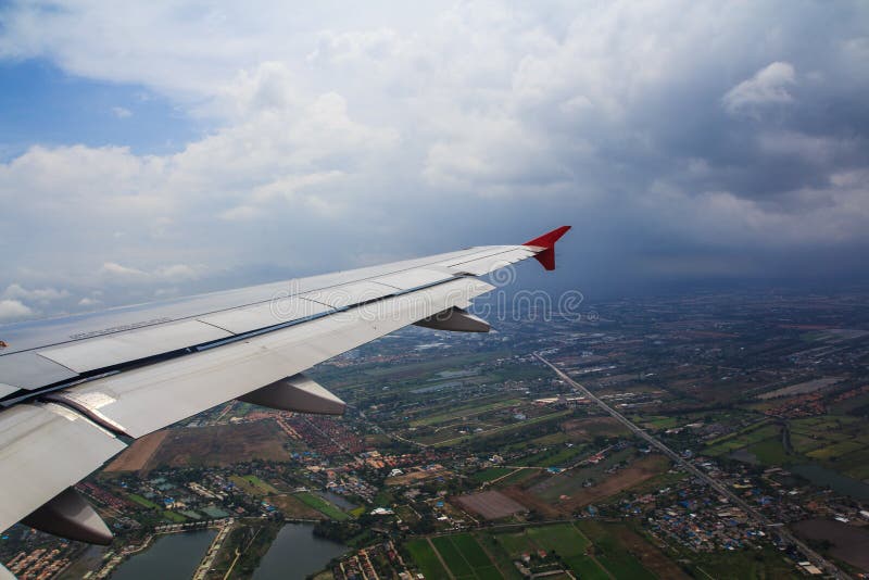 Aircraft wing in the air stock photo. Image of airport - 57951748