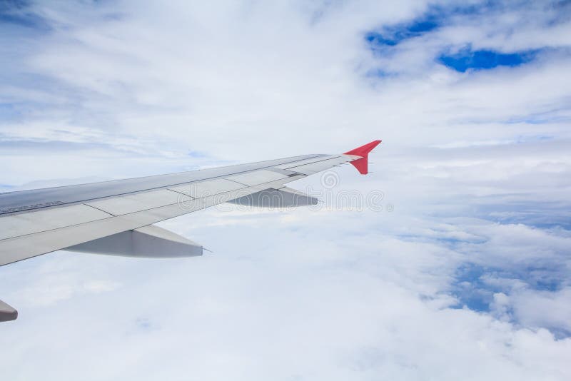 Aircraft wing in the air stock photo. Image of scenic - 58004032