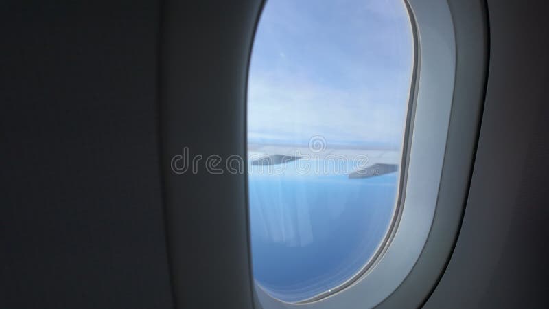 Inside View of Airplane Wing through Window during Flight Stock Video ...