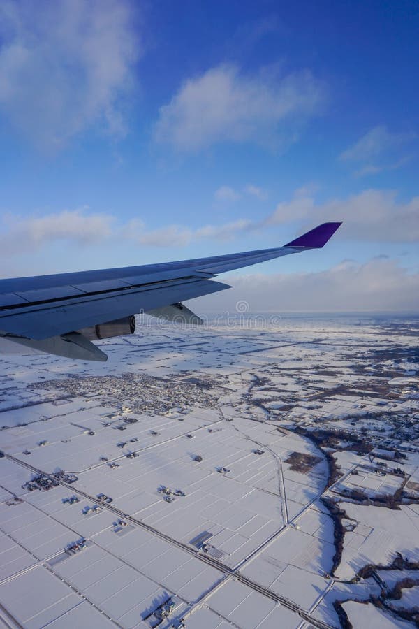 The Aircraft Wing View from Inside Aircraft with the Clear Blue Sly ...