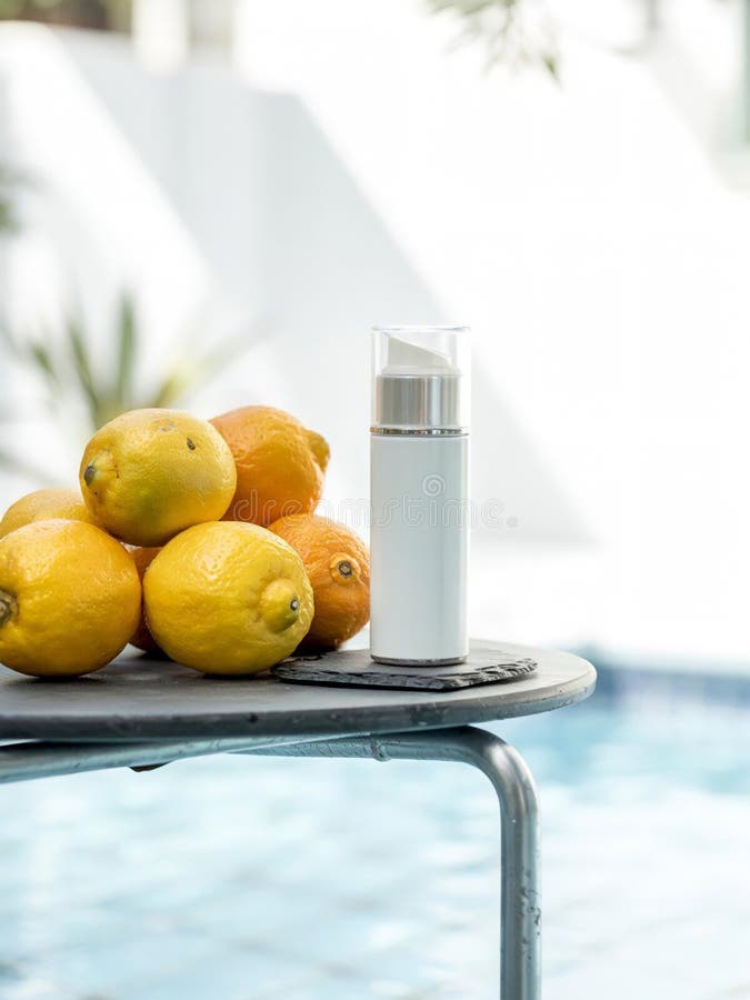 Airless Serum Pump Mockup Design Next To it is a Lemon Stock ...