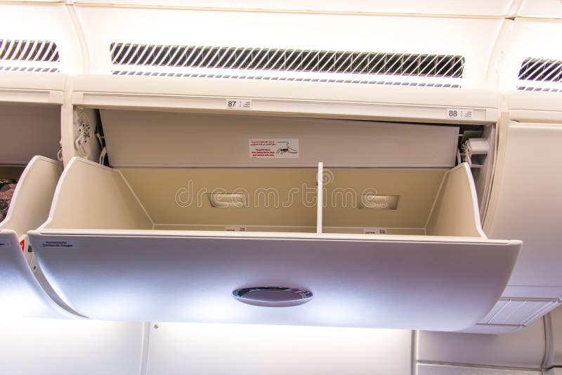 Airline Overhead Storage Compartment Stock Photo - Image of airbus ...