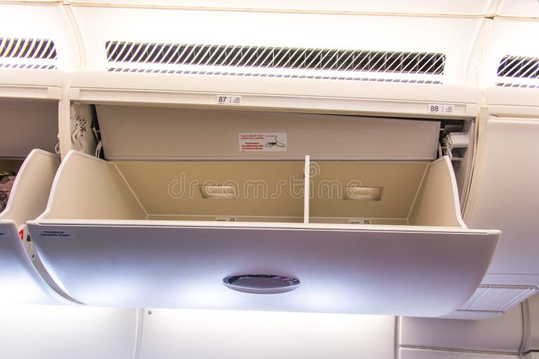 Airline Overhead Storage Compartment Stock Photo - Image of airbus ...