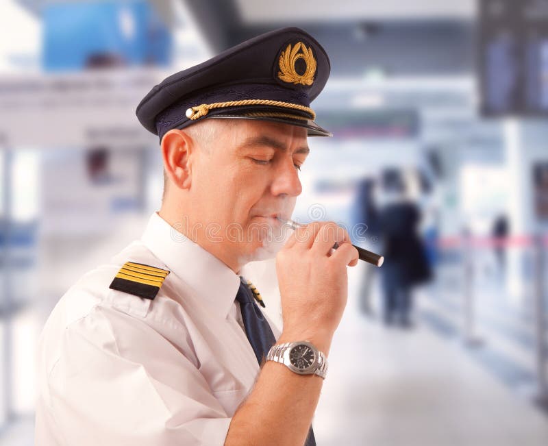 Airline Pilot with E-cigarette Stock Image - Image of nicotine ...