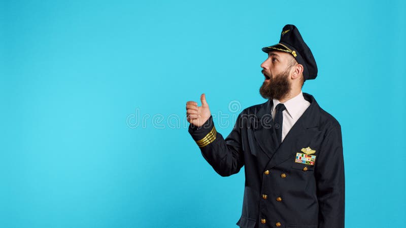 Airline Captain Raising Shoulders and Being Unsure Stock Photo - Image ...