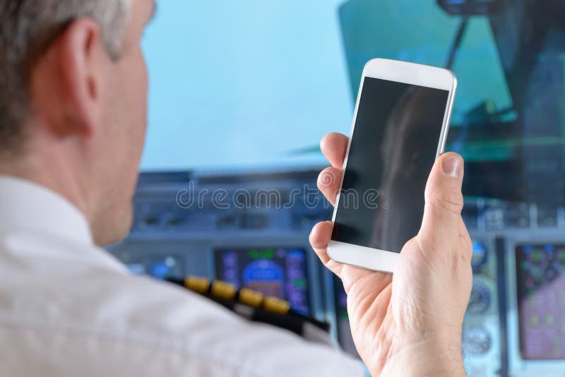Airline Pilot Using Smart Phone Stock Image - Image of instructor ...