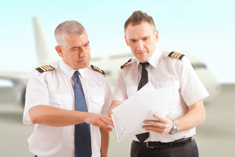 Airline Pilots at the Airport Stock Image - Image of clouds, happy ...
