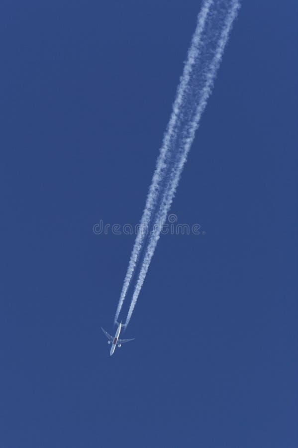 Airliner at Cruising Altitude Stock Photo - Image of trail, aeroplane ...