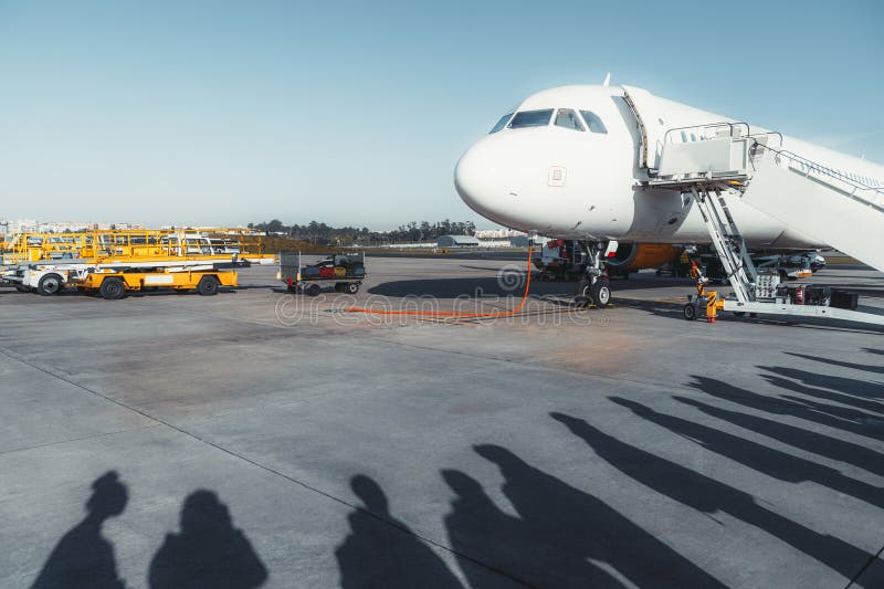 Airliner Parked Loading Passengers Stock Photo - Image of depart ...