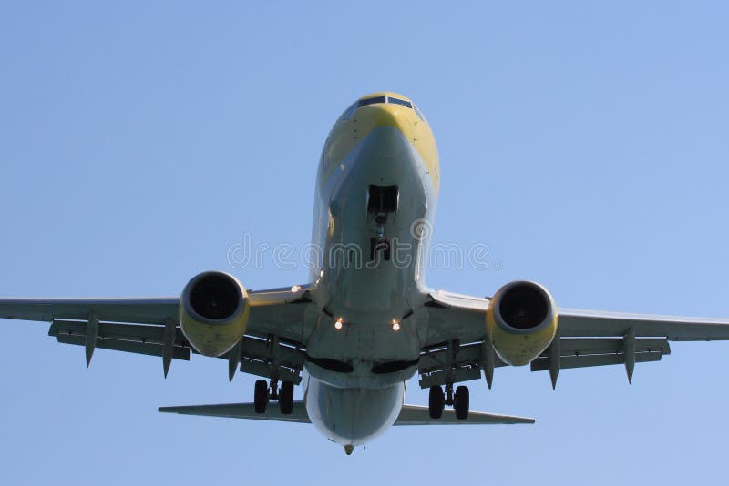 Airliner Passing Directly Overhead Stock Image - Image of approaching ...