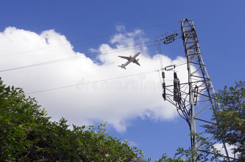 Airliner Take Off and Electricity Pylon Stock Photo - Image of pylon ...