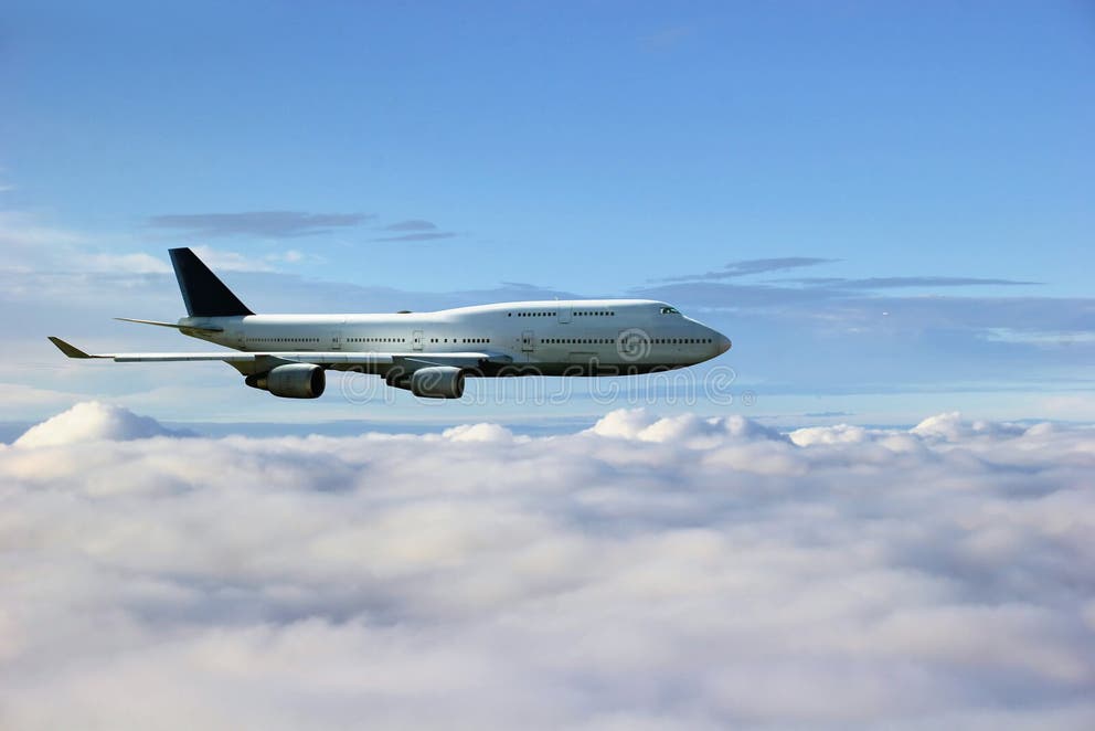 Airplane above the clouds stock photo. Image of flight - 9805014