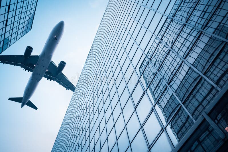 Airplane Above Modern Building Stock Photo - Image of success ...