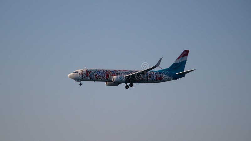 An Airplane in the Air with Graffiti on it S Tail Editorial Stock Image ...